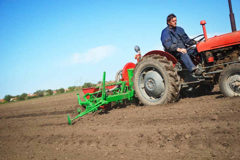 Farmer in Old-fashioned Tractor Stock Image - Image of farm, genetic ...