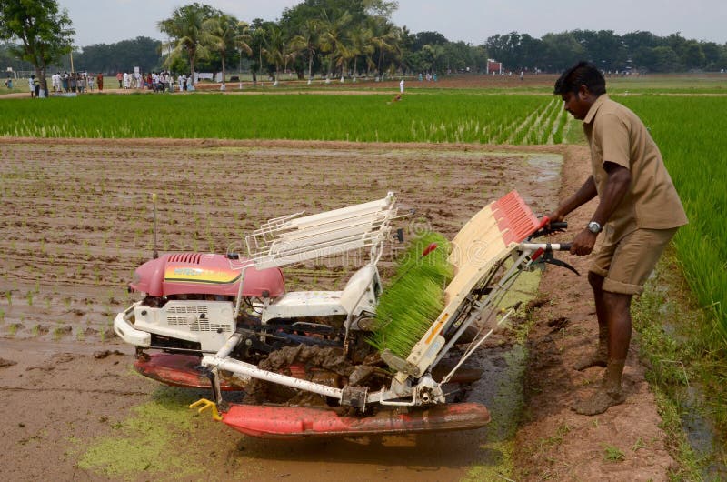 Farmer and plough machine editorial stock photo. Image of farm - 34615628