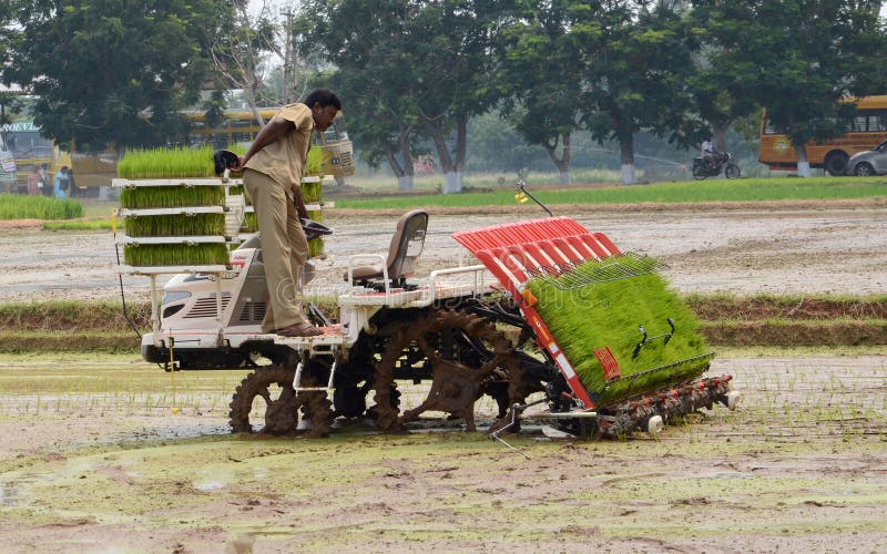 Farmer and plough machine editorial photo. Image of tree - 34615656