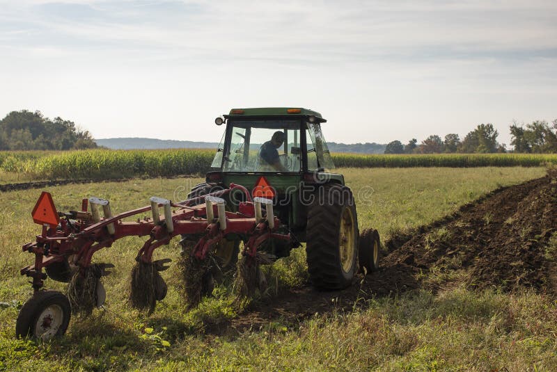 Tractor plowing editorial photo. Image of blades, plowing - 102716361