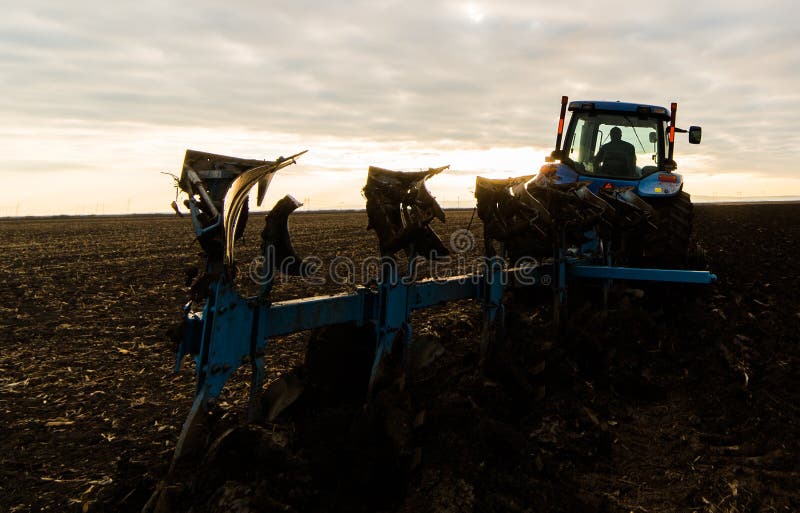 Farmer Plowing Stubble Field Stock Photo - Image of tractor, rural ...