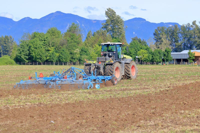 Farmer Plows Field for Spring Seeding Stock Image - Image of green ...