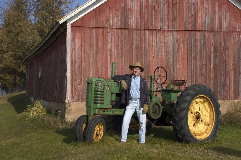 Farmer Poses with His Tractor Editorial Image - Image of outside ...