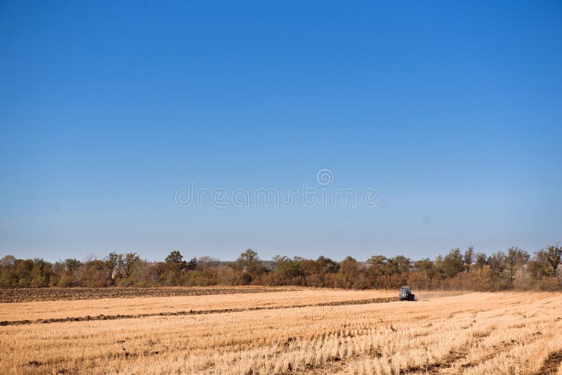 Farmer Preparing His Field in a Tractor Ready for Spring. Stock Photo ...