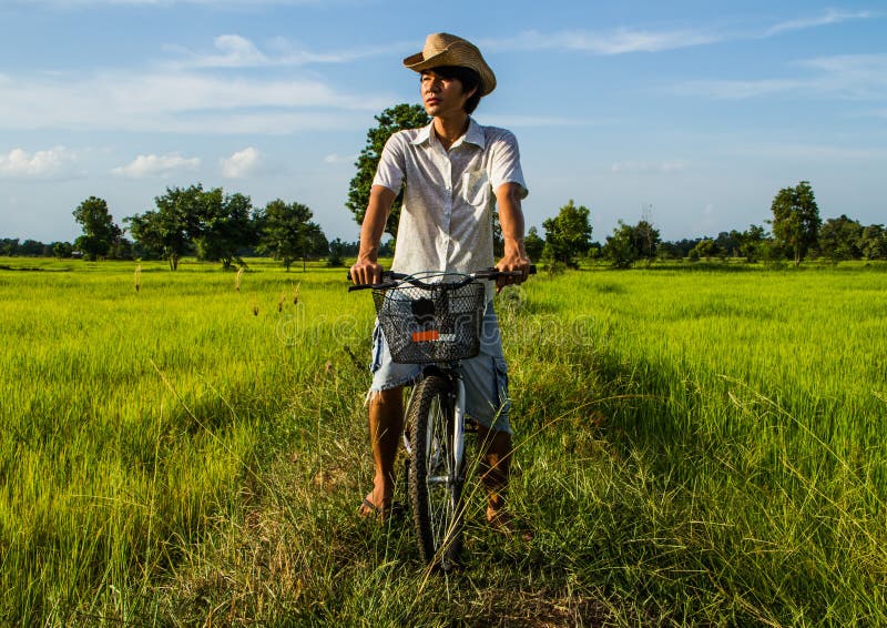 Farmer riding bicycle stock photo. Image of danger, outdoors - 35242944