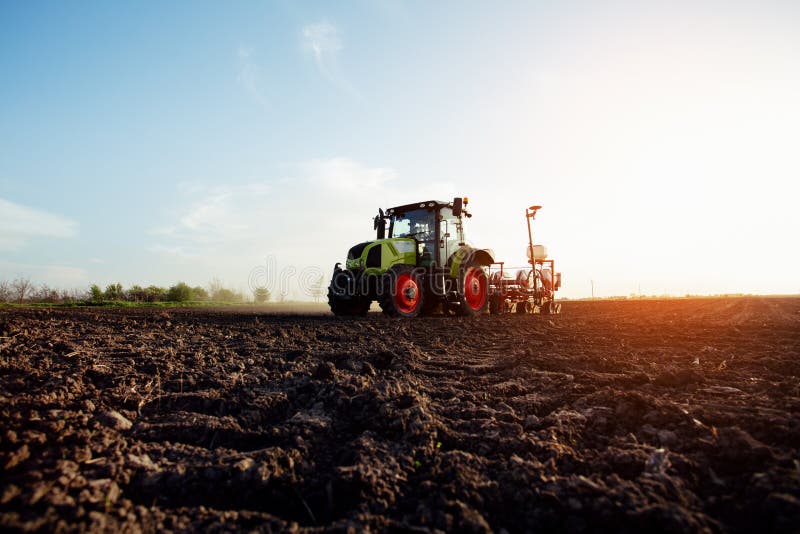 Farmer Seeding Crops at Field. - Image Stock Photo - Image of industry ...