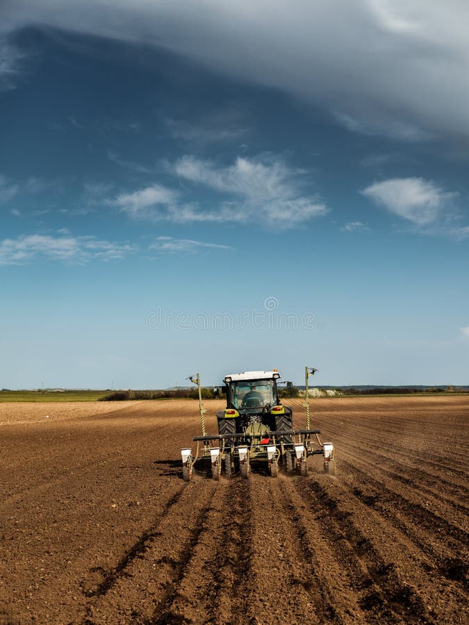 Farmer Seeding, Sowing Crops at Field. Stock Photo - Image of equipment ... Farmer Seeding, Sowing Crops at Field. Stock Photo - Image of equipment ...