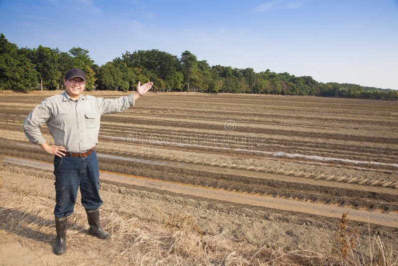 Farmer Showing His Farming Land Stock Image - Image of arms, nature ...