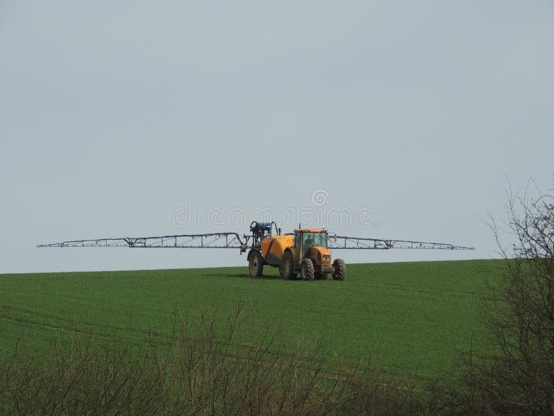 Farmer Spraying Chemicals in the Fields Stock Image - Image of ...