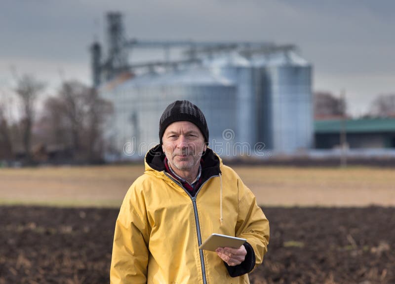 Farmer with Tablet in Field Stock Image - Image of farming ...