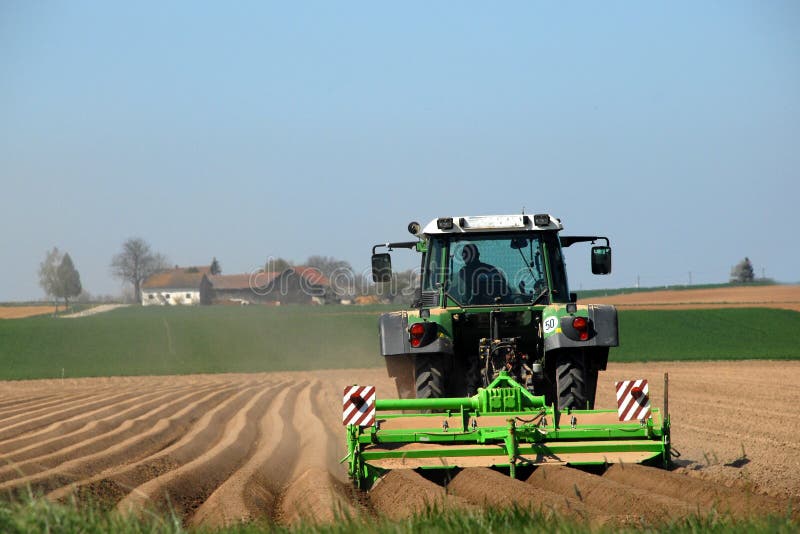 Farmer Tilling Field stock image. Image of dirt, agriculture - 2470681