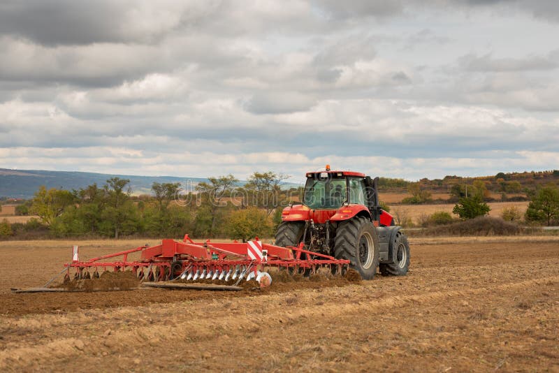Farmer in Tractor Preparing Land. Stock Image - Image of industry, plow ...