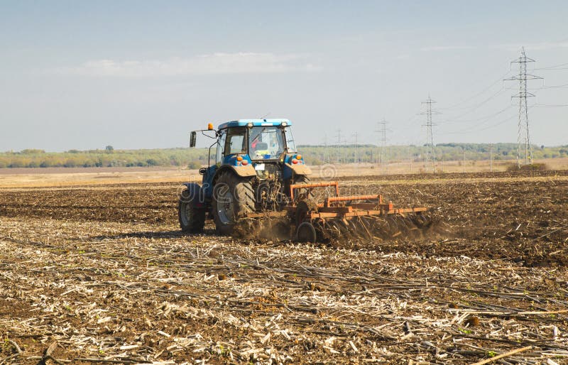 Farmer in Tractor Preparing Land Stock Image - Image of farming ...