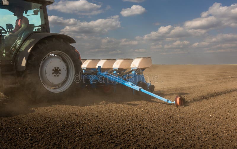 Farmer in Tractor Sowing Crops Stock Image - Image of corn, tractor ...