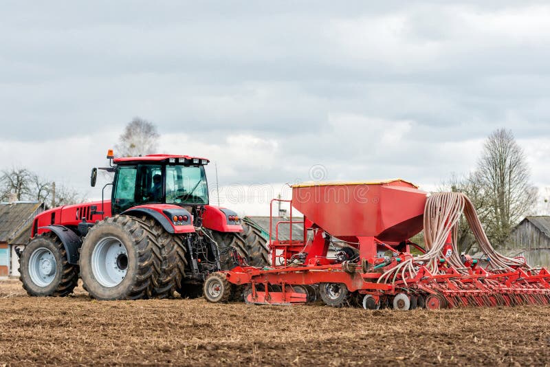Farmer Tractor Working in the Field. Spring Time for Sowing Stock Photo ...