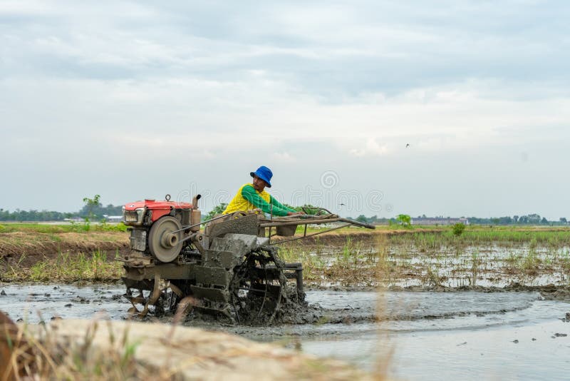 Farmers Plowing the Fields Using Tractors Editorial Stock Photo - Image ...