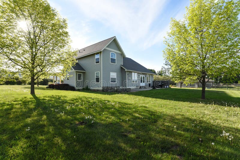 Farmhouse Backyard with Trees Stock Image - Image of field, grass ...