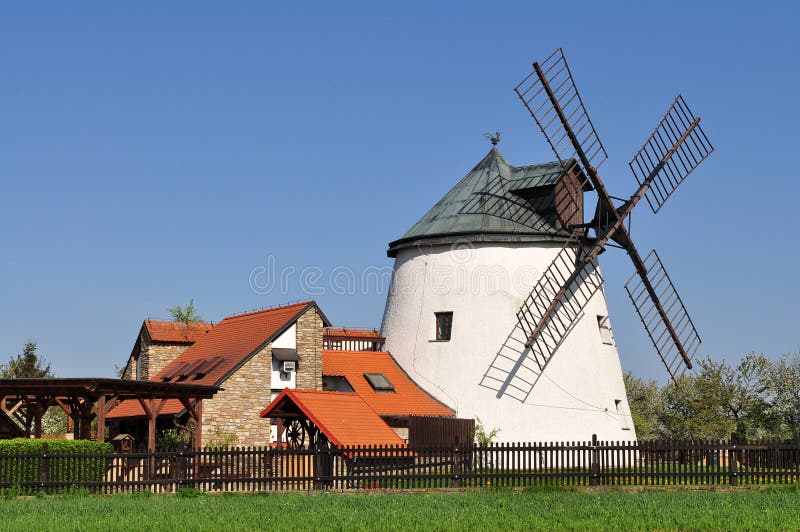 Farmhouse with Old Windmill Stock Photo - Image of farm, crusher: 24654950