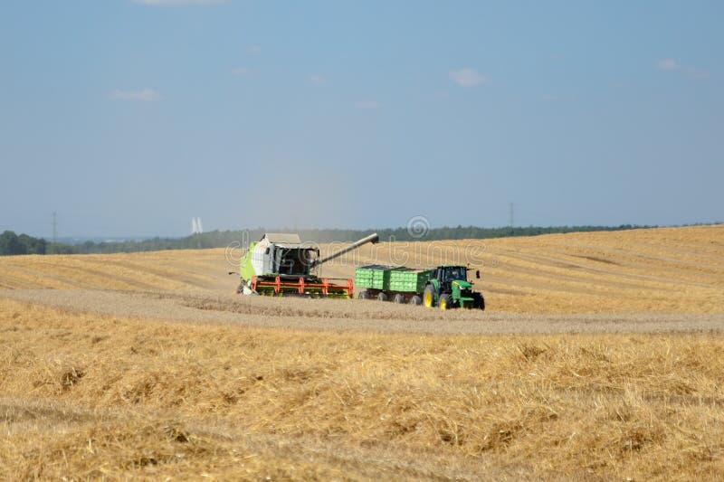 Farming in Poland, Harvester at Work Editorial Stock Photo - Image of ...