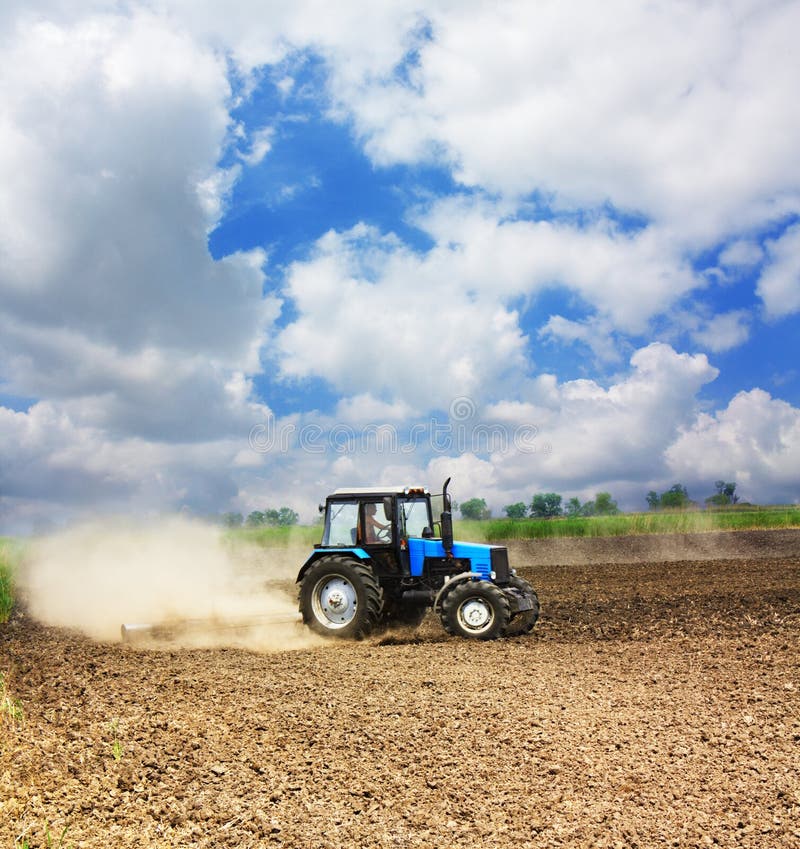 Tractor stock photo. Image of rolmat, parked, green, slope - 13309558