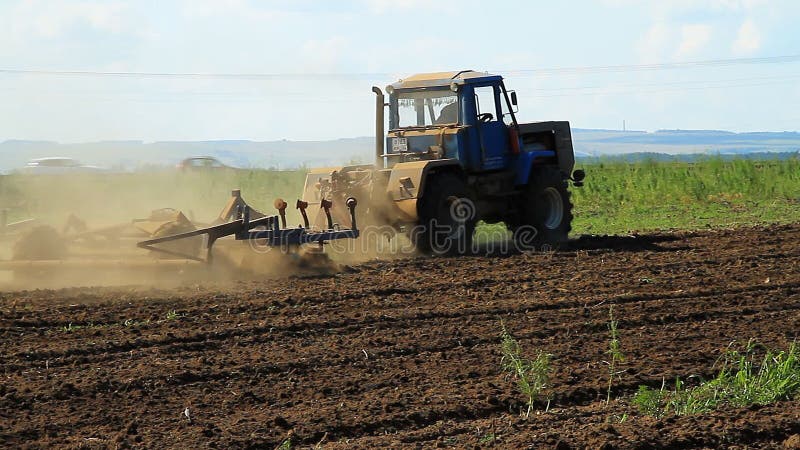 Farming. the Tractor Plows the Land. Stock Video - Video of farming ...