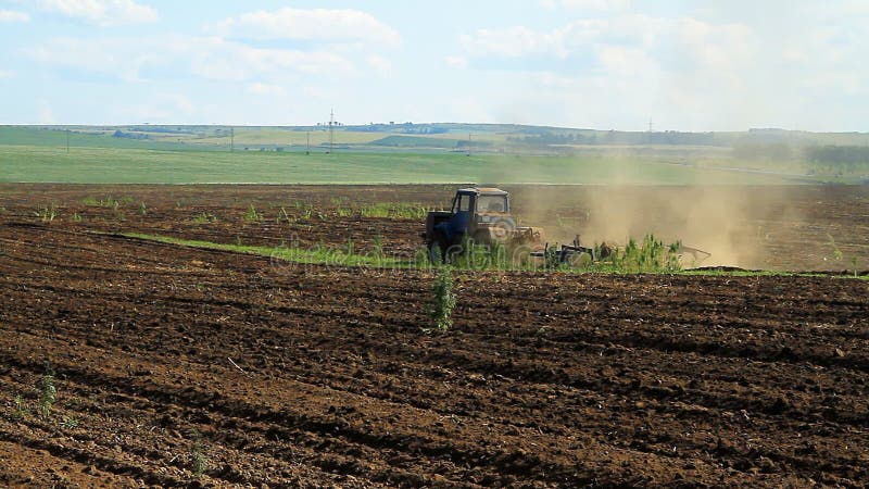 Farming. the Tractor Plows the Land. Stock Footage - Video of farmer ...