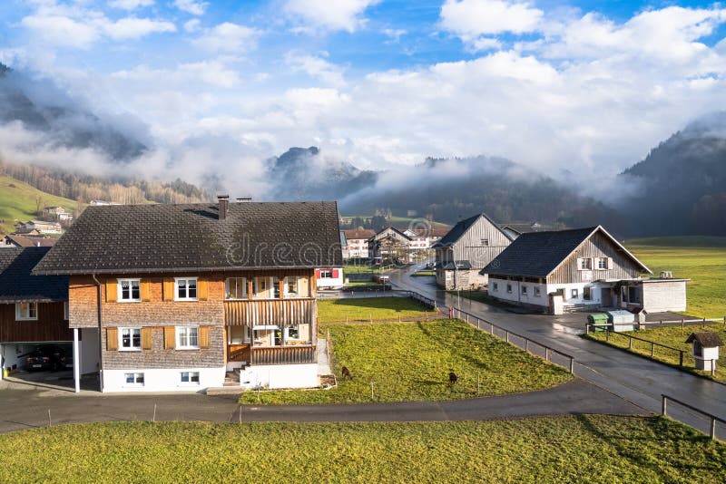 Farms in a Alpen mountains stock photo. Image of farms - 174603684