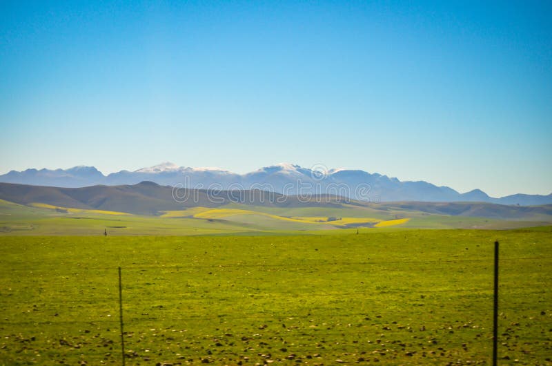 Farms fields and mountains stock photo. Image of mountain - 225673232
