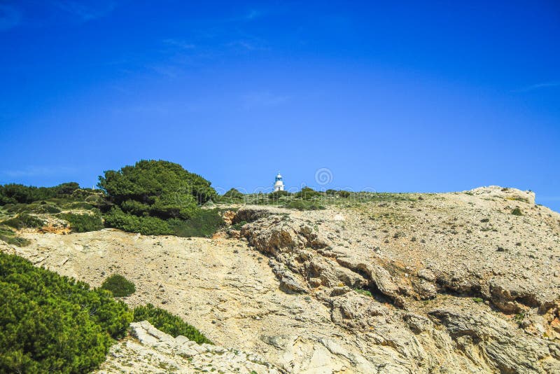 Faro De Capdepera Lighthouse on Top of Cliffs in Cala Gat Near Cala ...