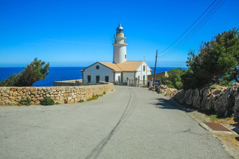 Faro De Capdepera Lighthouse on Top of Cliffs in Cala Gat Near Cala ...