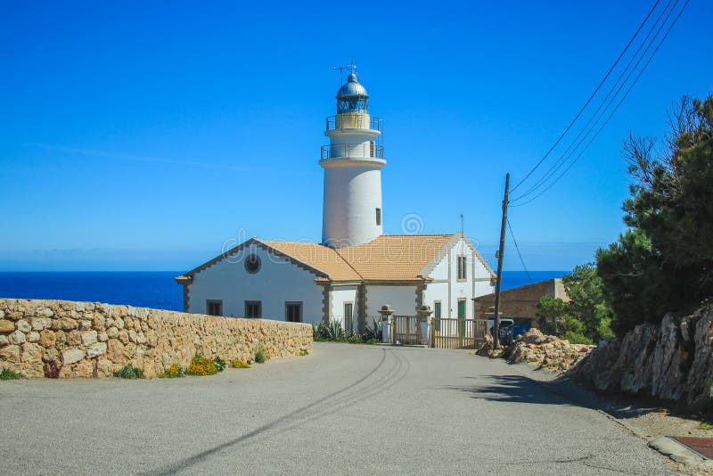 Faro De Capdepera Lighthouse on Top of Cliffs in Cala Gat Near Cala ...