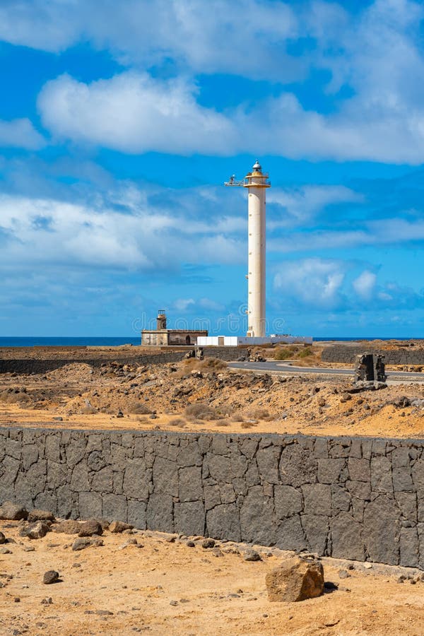 The Faro De Punta Pechiguera Lighthouse on Playa Blanca Stock Image ...