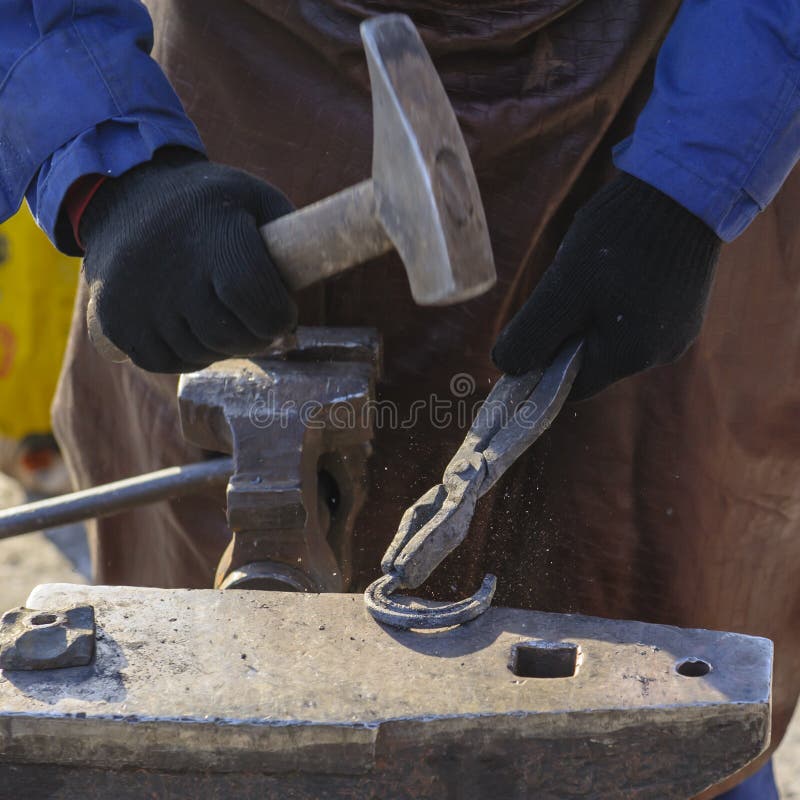 Farrier making horseshoe stock image. Image of metalwork - 29951265