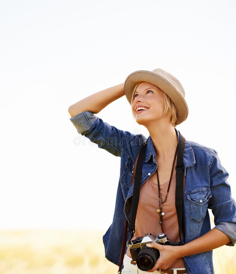 Fascinated by Nature. an Attractive Young Woman Outdoors on a Summer ...