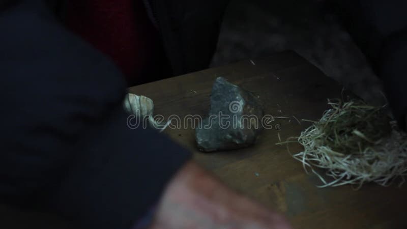 Fascinating Primitive Firecraft: Expert Ignition in a Shell Stock Video ...