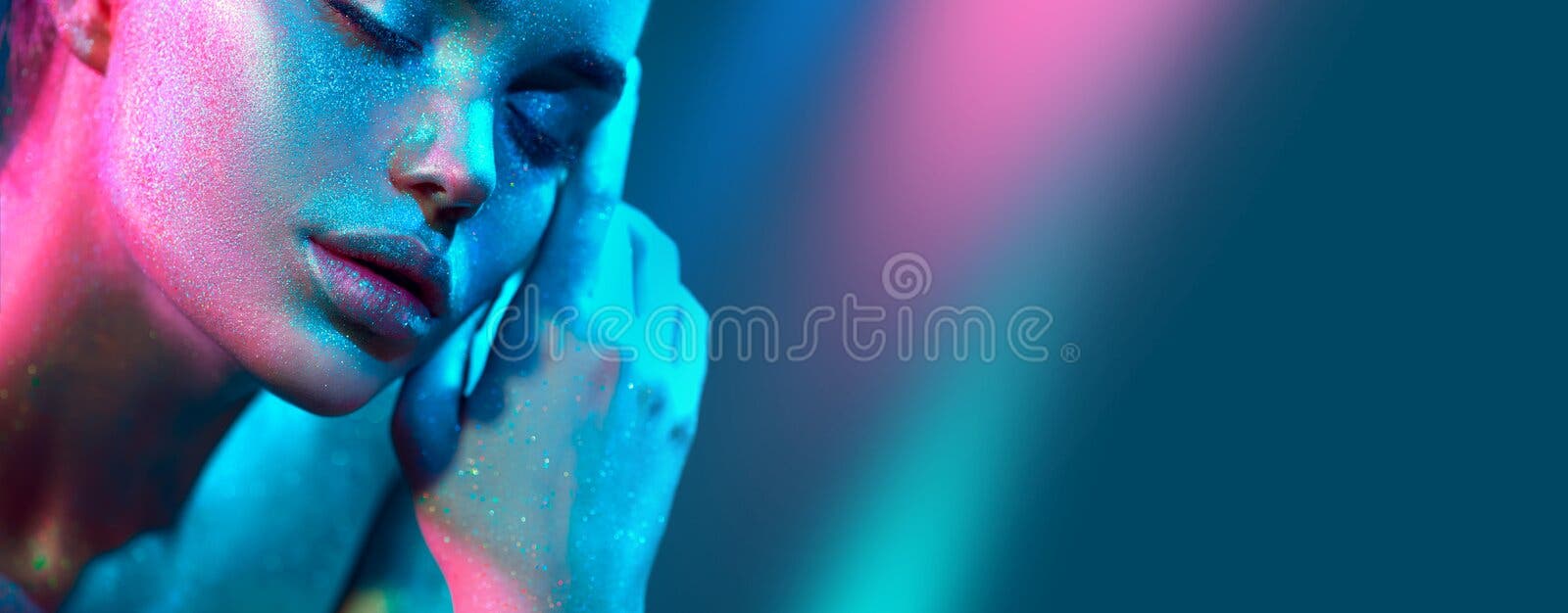Fashion Model Woman In Colorful Bright Sparkles And Neon Lights Posing