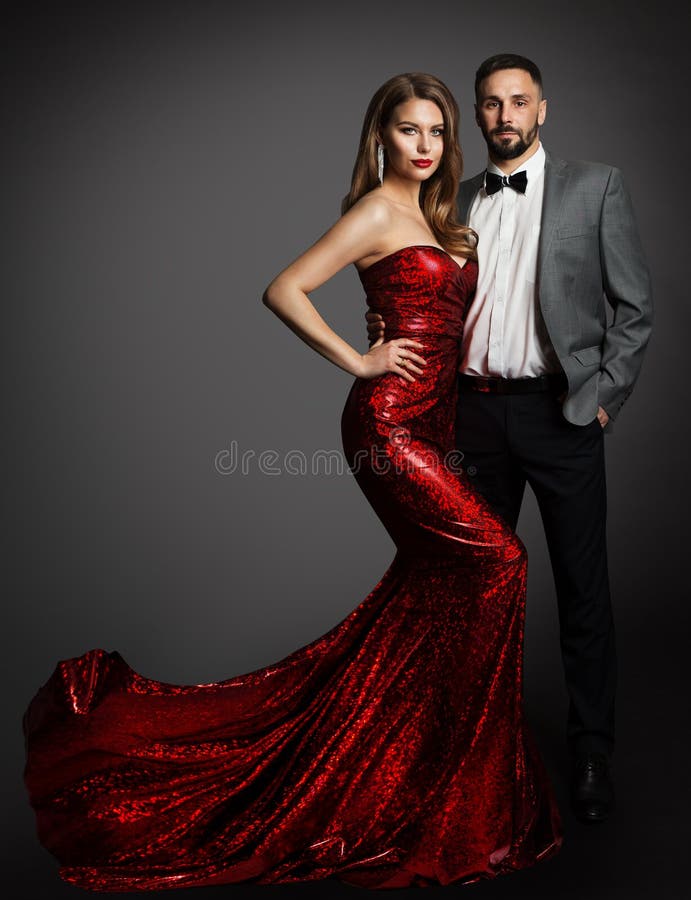 Couple Fashion Beauty Beautiful Woman In Red Dress And Elegant Man