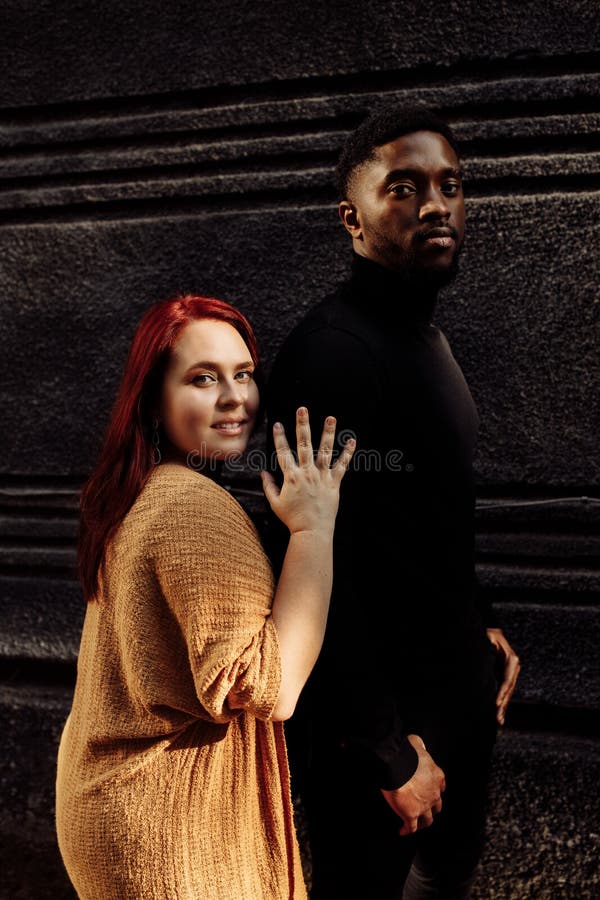 Fashion Couple Walking At The City Stylish Woman Cuddle With