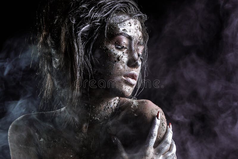 Fashion Portrait Of A Dark Skinned Girl With Silver Foil Make Up