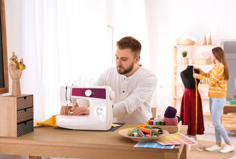 Fashion Designer Sewing New Clothes with Machine Stock Image - Image of ...