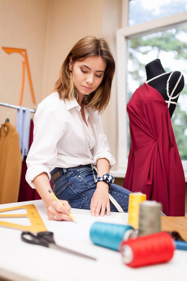 Fashion designer studio stock image. Image of young, professional ...