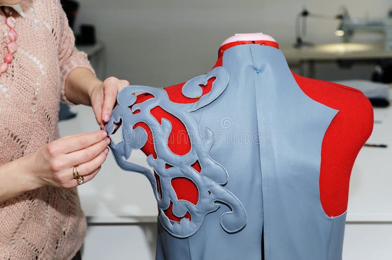 Fashion designer at work. stock image. Image of women - 67778295