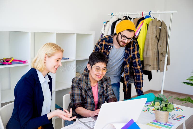 Fashion designers working stock image. Image of business - 97730707