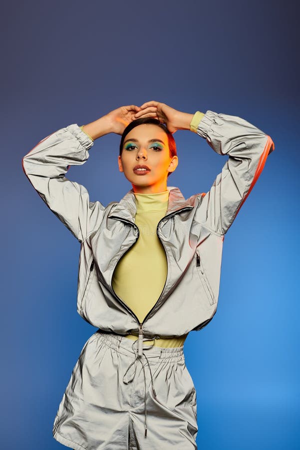 Fashion-forward Woman Showcases a Chic Stock Photo - Image of studio ...