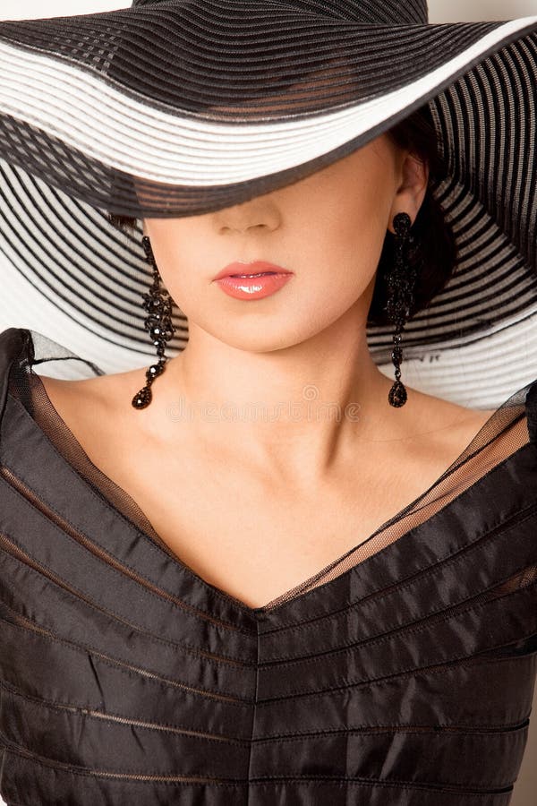 Fashion Girl in a Big Hat in the Studio Stock Image - Image of hair ...