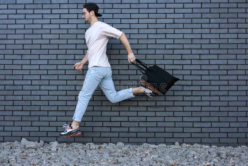 Fashion Guy Run Over Brick Black Urban Background Stock Photo - Image ...