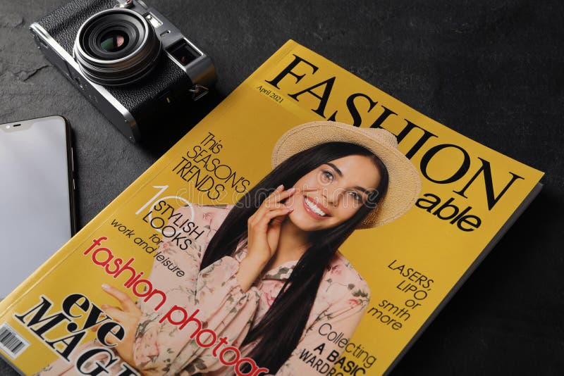 Fashion Magazine and Camera on Black Table, Closeup Stock Image - Image ...