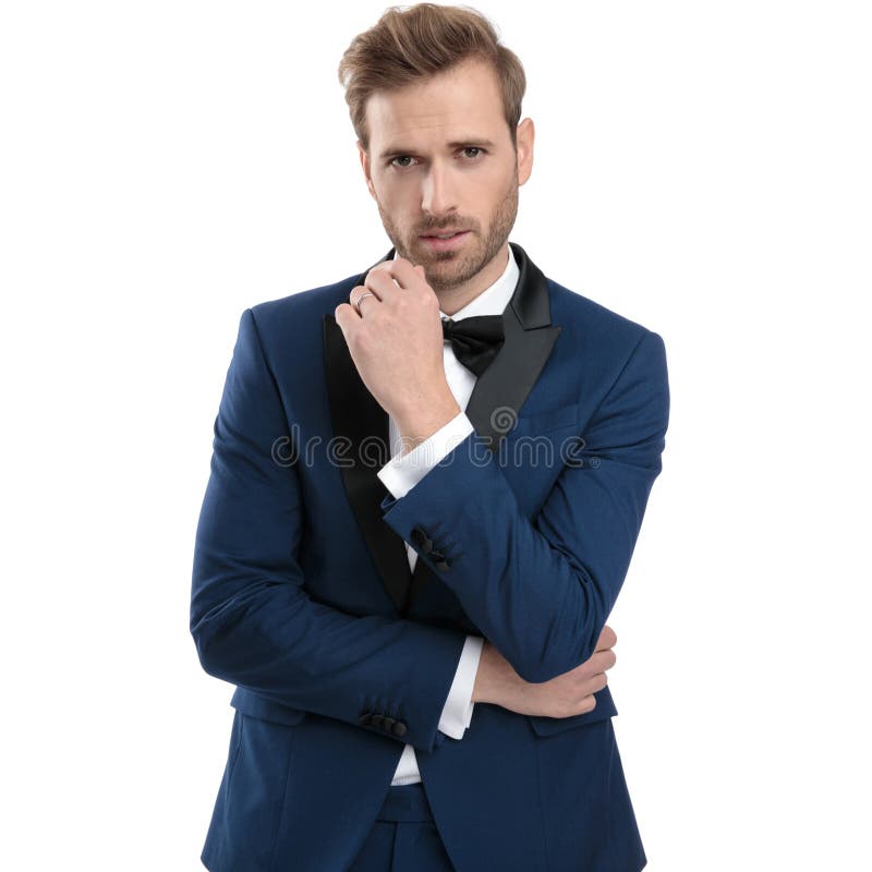 Fashion Man in Blue Suit is Thinking with Folded Arms Stock Photo ... Fashion Man in Blue Suit is Thinking with Folded Arms Stock Photo ...