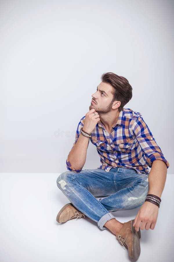 Fashion Man Sitting and Thinking Stock Image - Image of crossed ...