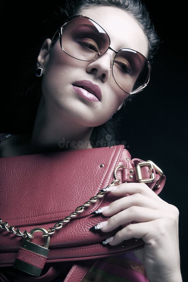 Fashion model with a bag stock photo. Image of fashion - 62016476